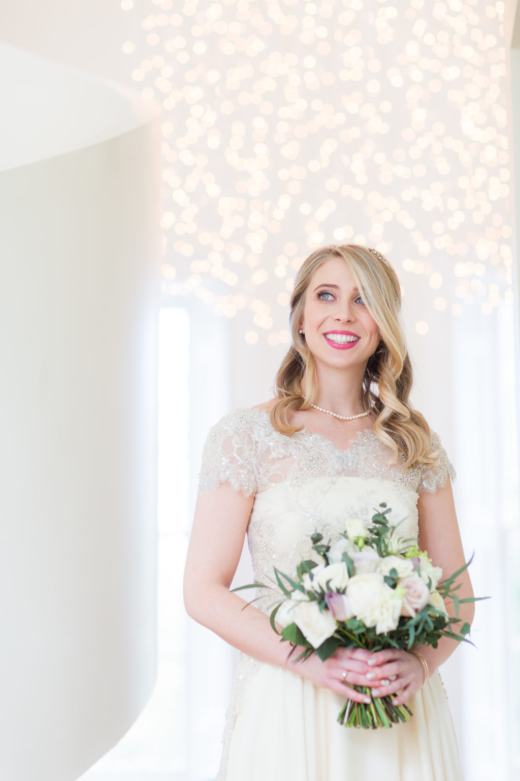 gold silk dress with lace, pearls and sequins and detachable train